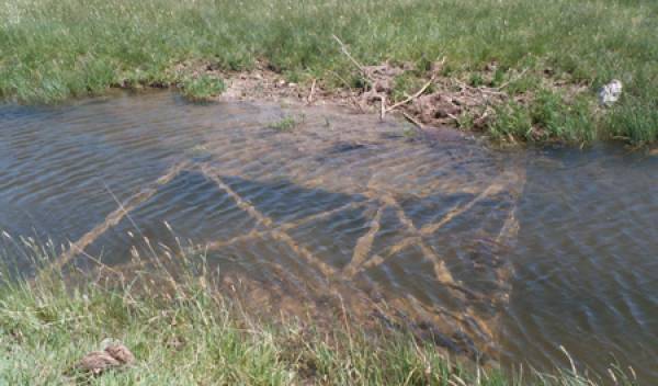 Submerged Flow in Parshall Flumes